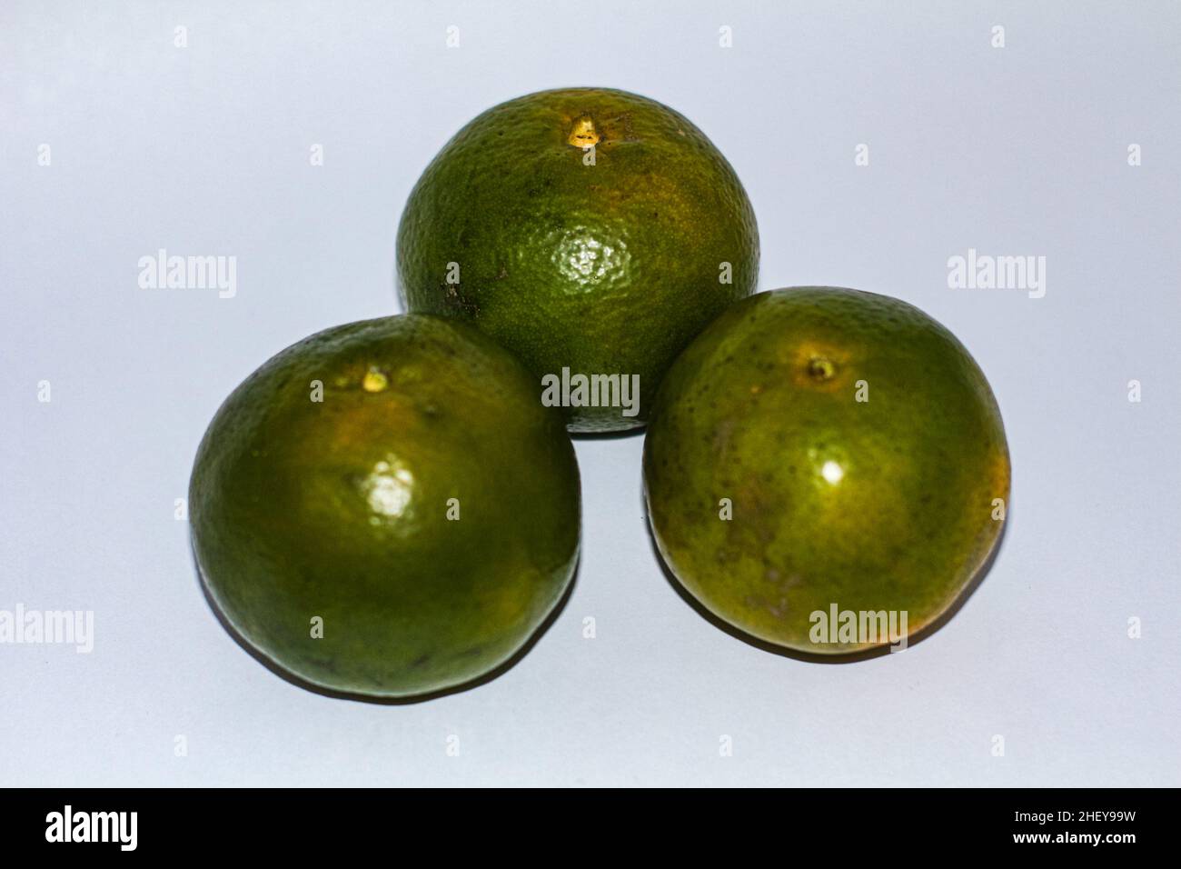 Local green citrus fruit Stock Photo - Alamy