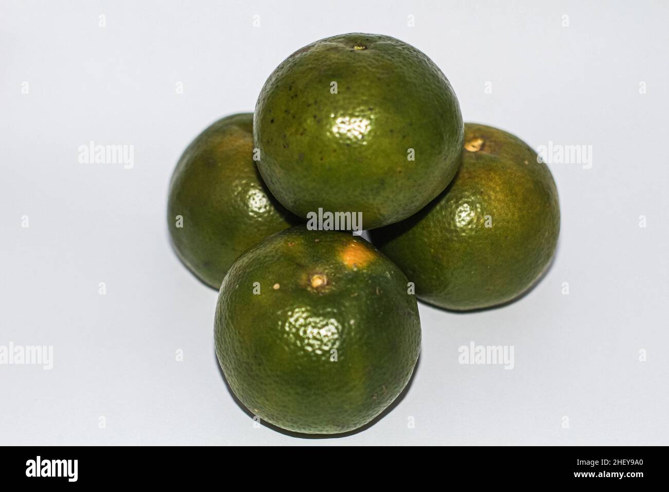 Local green citrus fruit Stock Photo - Alamy