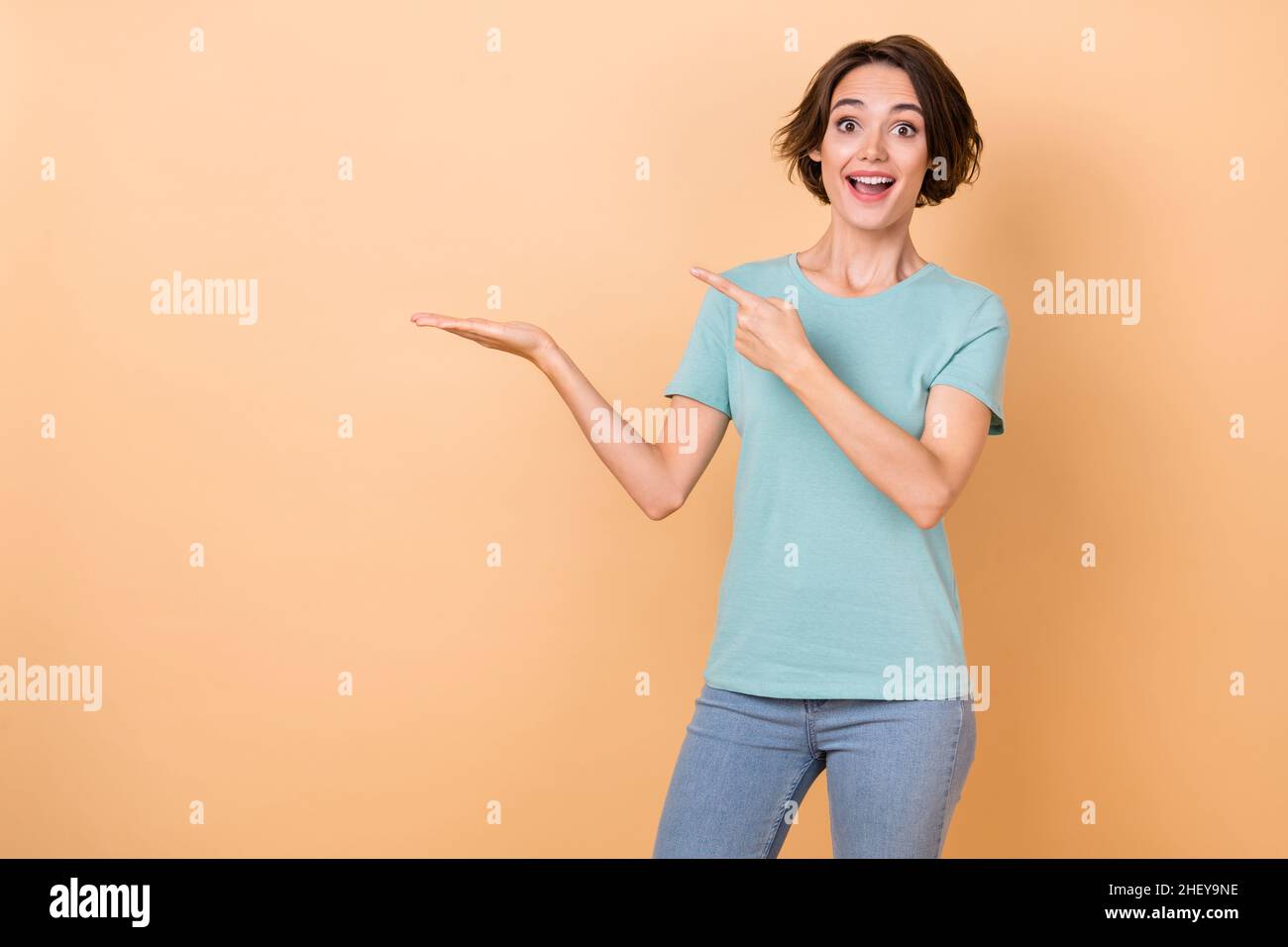 Photo of young girl excited indicate finger promo ads suggest recommend ...