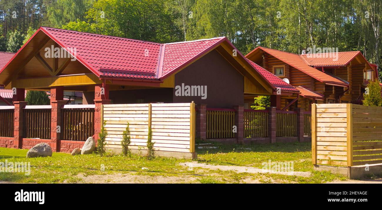 Photo of a beautiful modern wooden house in the countryside Stock Photo ...