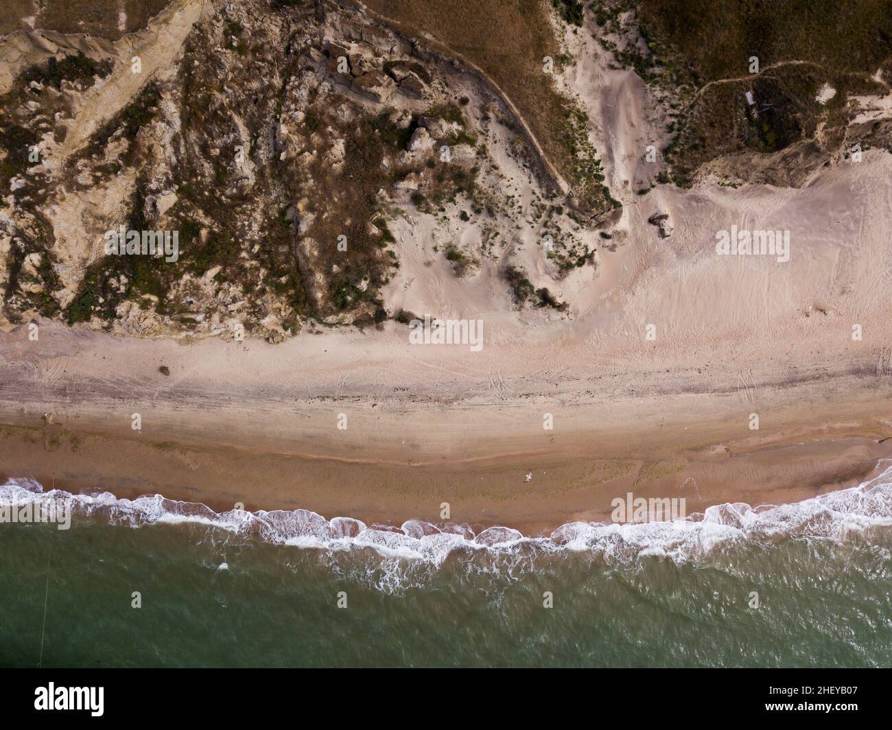 Aerial view of ocean waves crashing on beach 4k footage. Top Down ...
