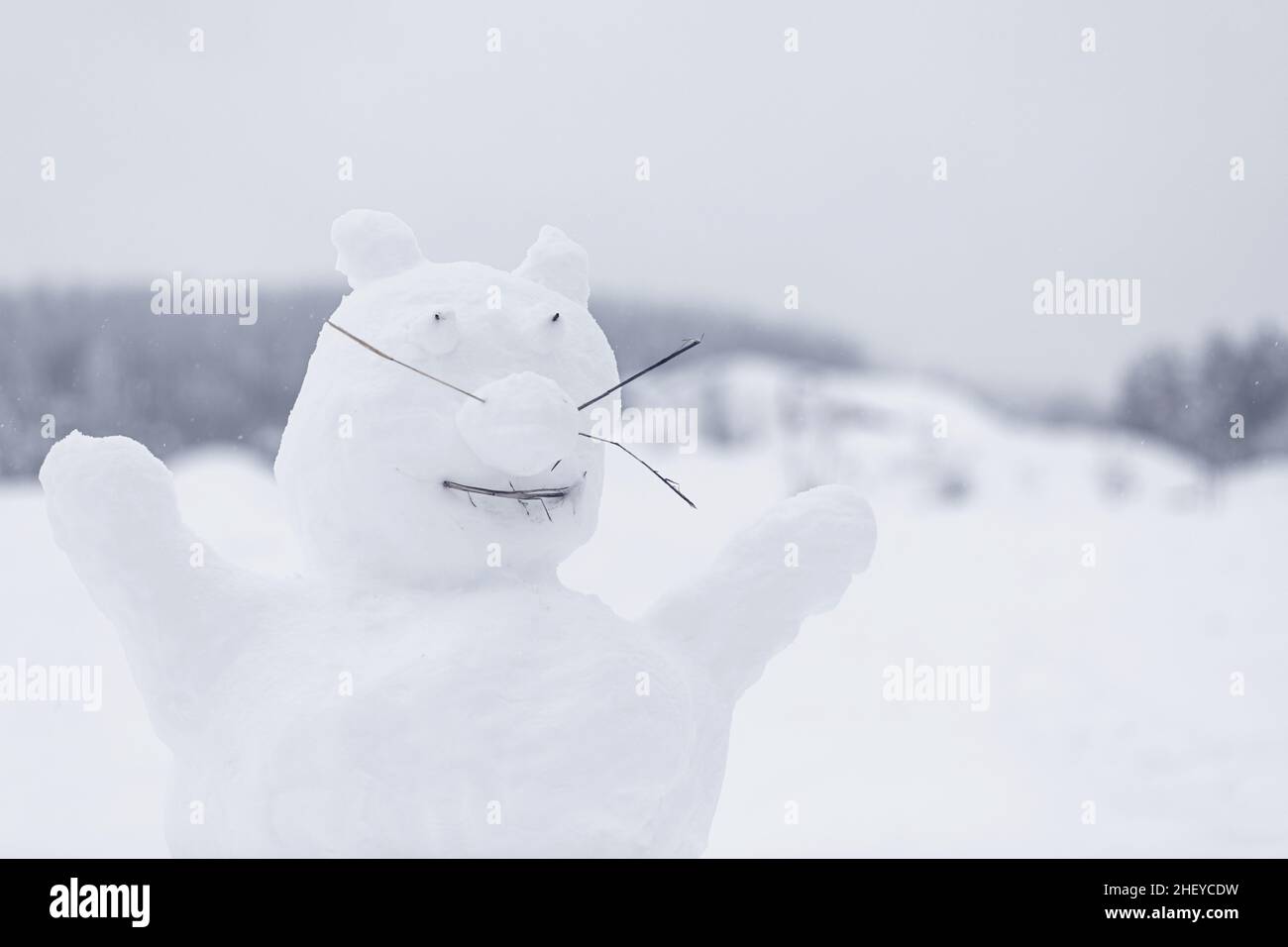 The figure of funny snowman animal in snowy field Stock Photo - Alamy