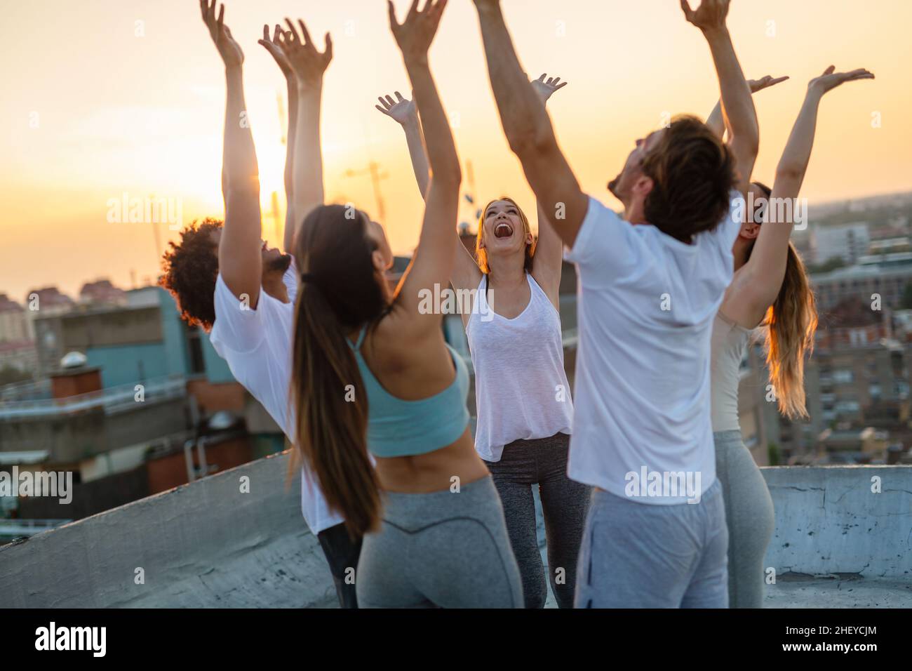 Group of fit people exercising together to stay healthy. Sport people ...