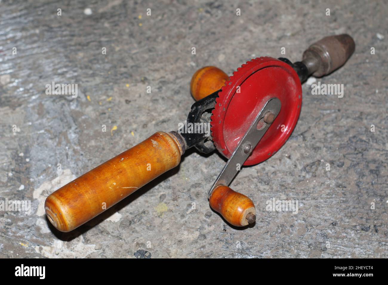 The old manual wood hand drill is still in use today Stock Photo - Alamy
