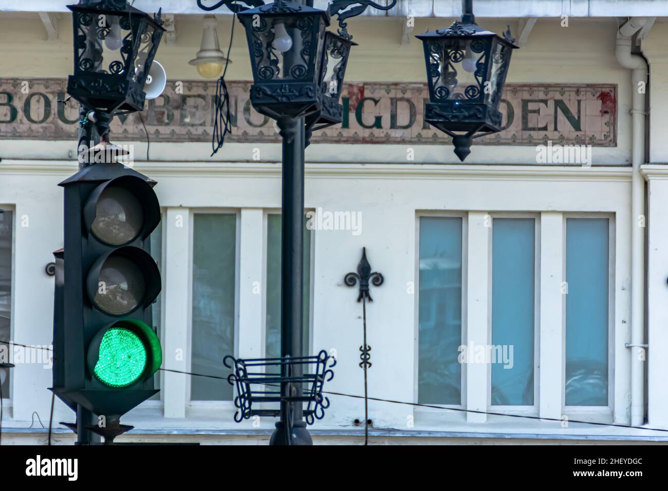 Decorated vintage and old traffic green light with retro concept metal ...