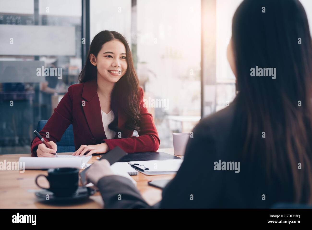 During a job interview, Woman in a suit and gives a presentation about ...