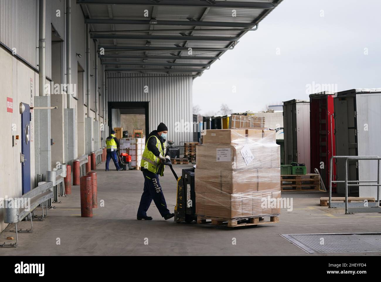 Hamburg, Germany. 12th Jan, 2022. Trucks are loaded on the premises of ...