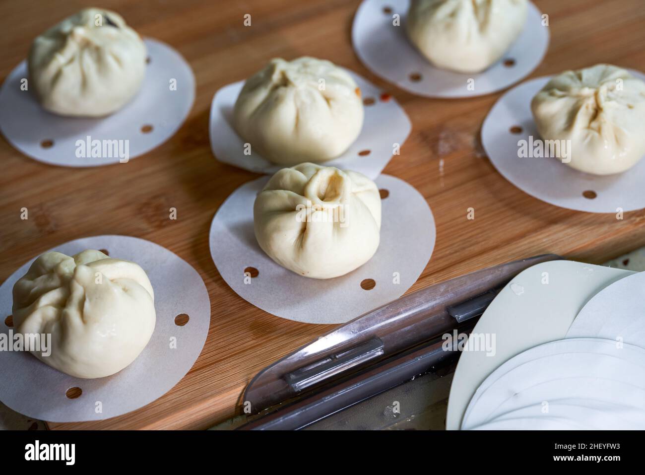 Finished fresh meat buns made in the kitchen Stock Photo - Alamy