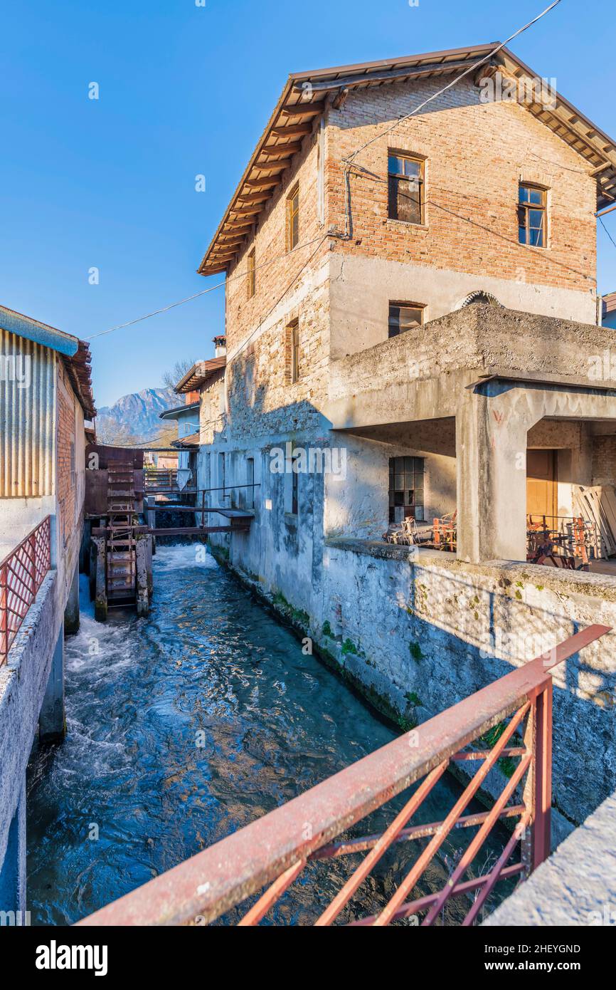 The awakening of spring among flowers, meadows and ancient mills Stock ...