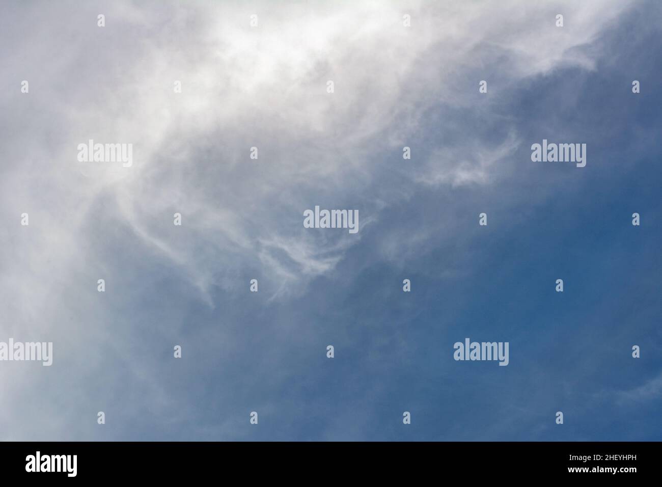 Spindrift clouds, sky with cirrus clouds light and shadow distance and ...