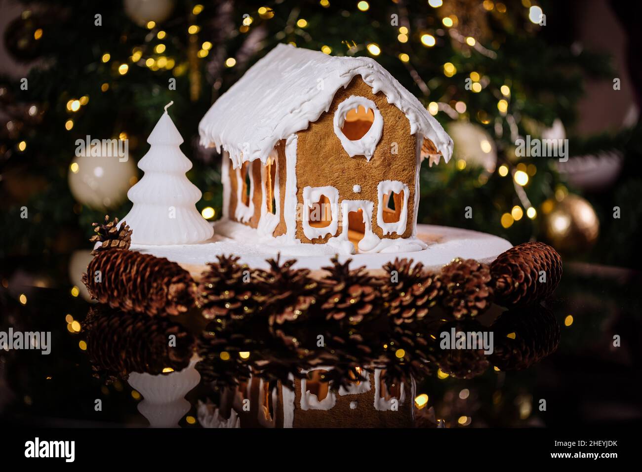 Christmas house from ginger cookies with ginger man outside decorated ...