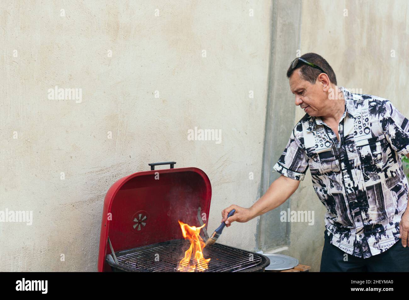 Older men grilling hi-res stock photography and images - Alamy