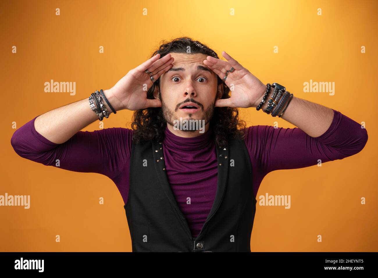 Frustrated young man failing, feeling upset portrait against yellow ...