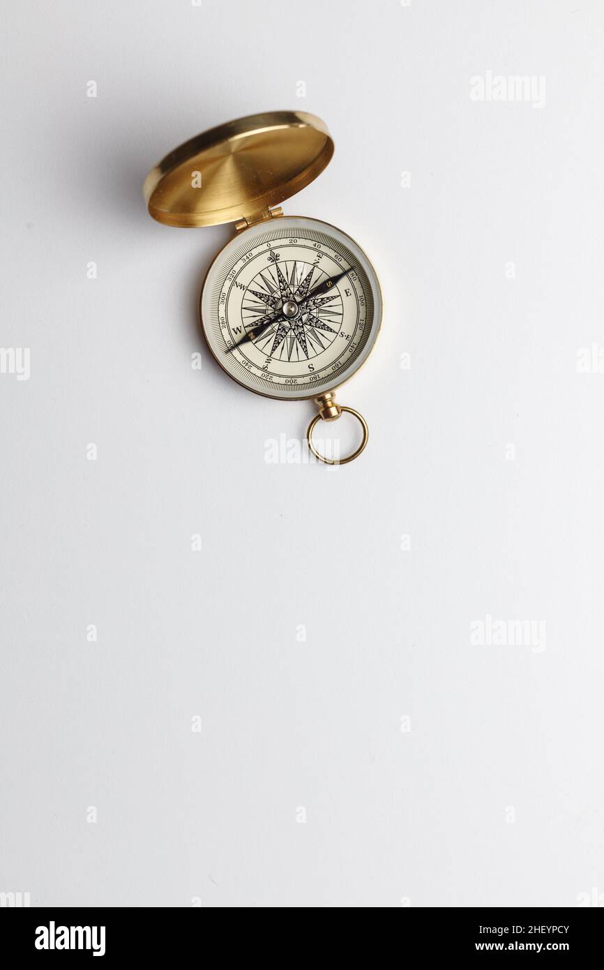 Golden compass on white background concept - direction, top view Stock ...