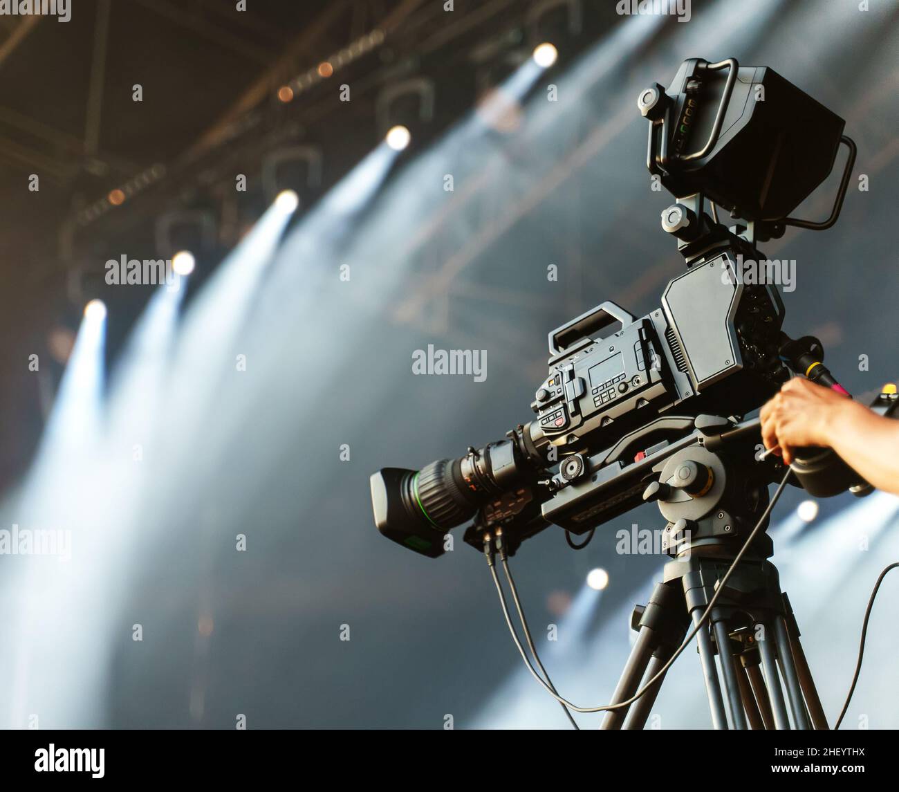 Professional broadcast digital video camera on stage Stock Photo - Alamy