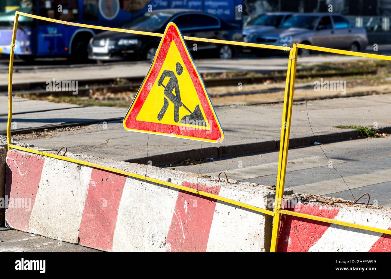 Road works traffic sign at the city street. Under construction road ...