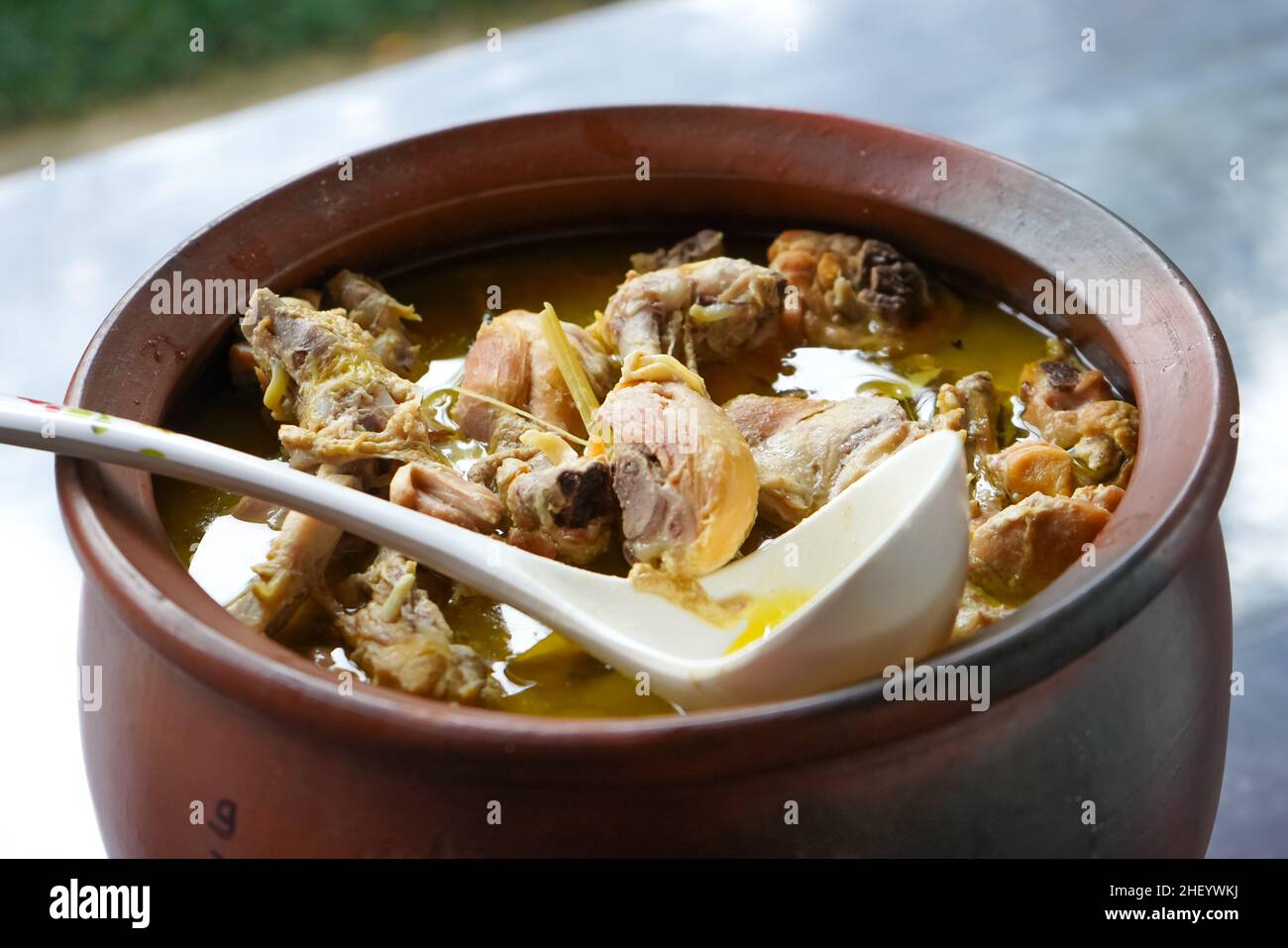 Vegetable curry chicken curry on a basin or stove made of clay Stock ...