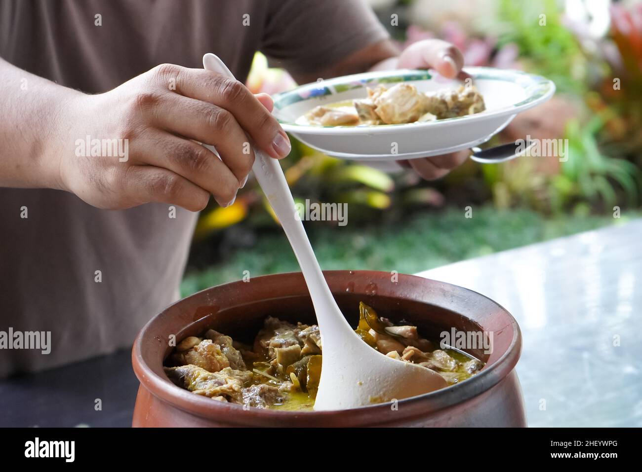 Vegetable curry chicken curry on a basin or stove made of clay Stock ...