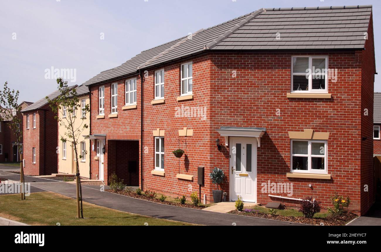 Modern housing estate development, showhomes and street scene, corner ...