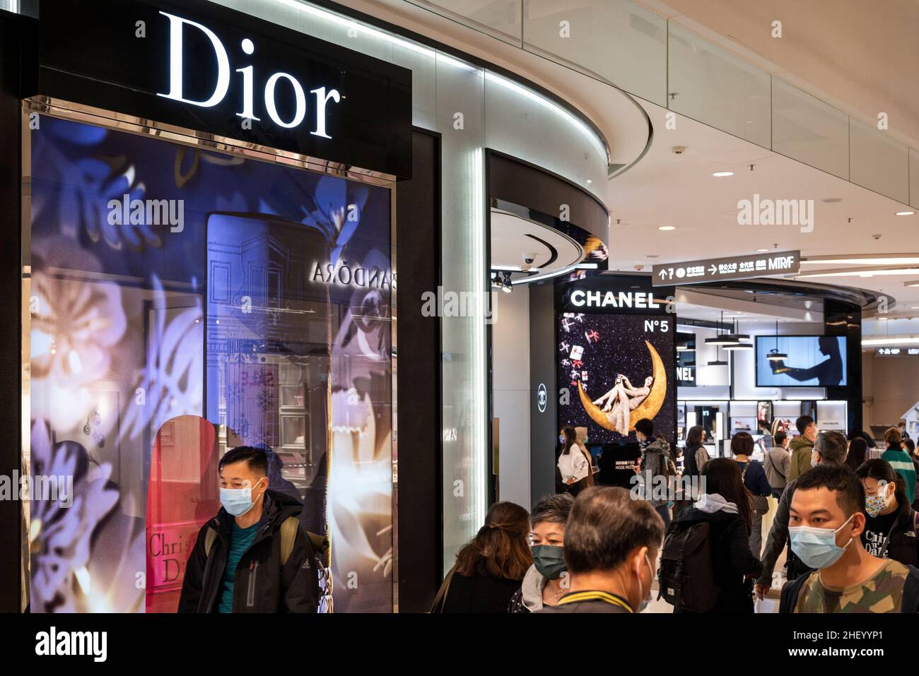 Shoppers walk past the French Christian Dior luxury goods, clothing and ...