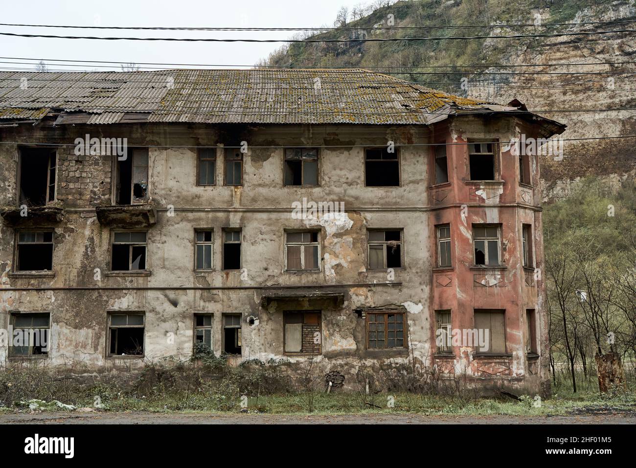 Abandoned crumbling buildings in a residential city. A dying city ...