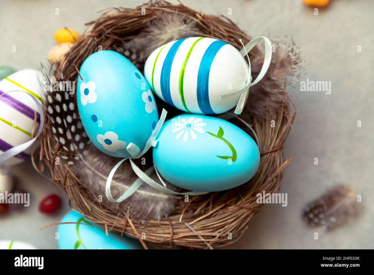Happy Easter concept. Preparation for holiday. Colorful decorated blue ...