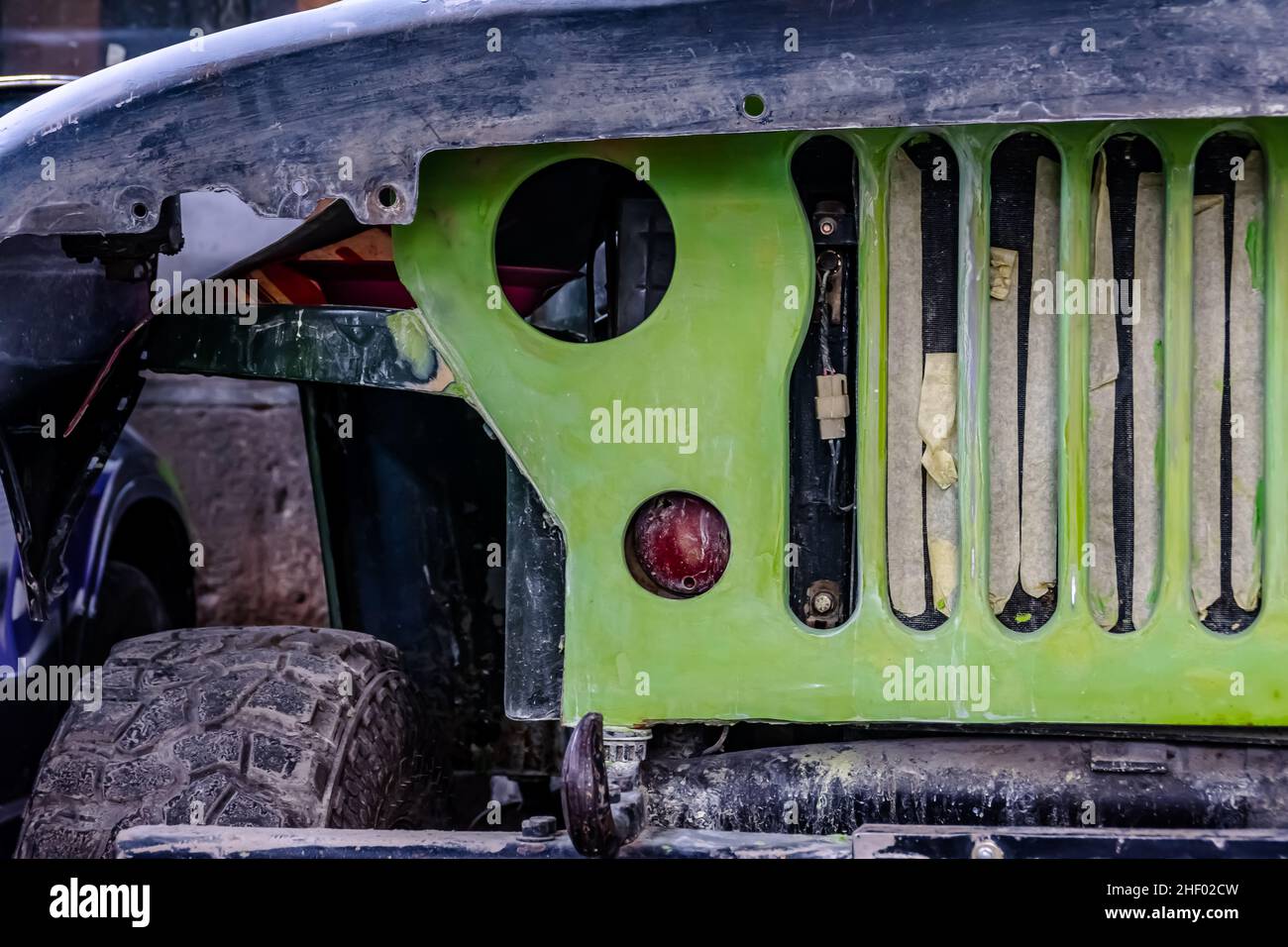 unfinished restoration old and vintage car on paint work auto garage ...