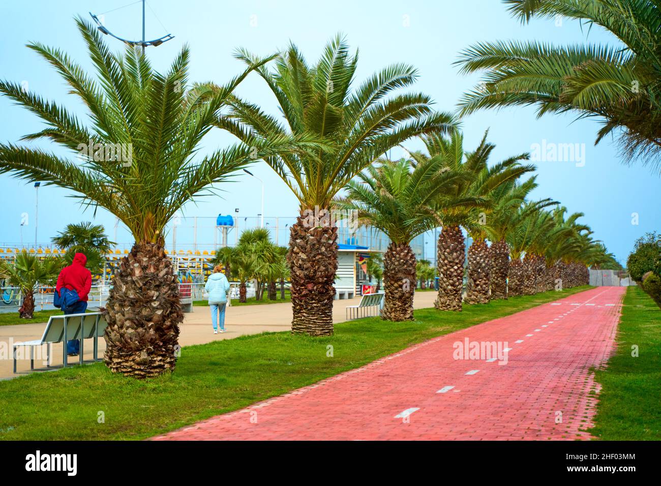 Cycle path across the entire embankment by the sea. The resort town of ...