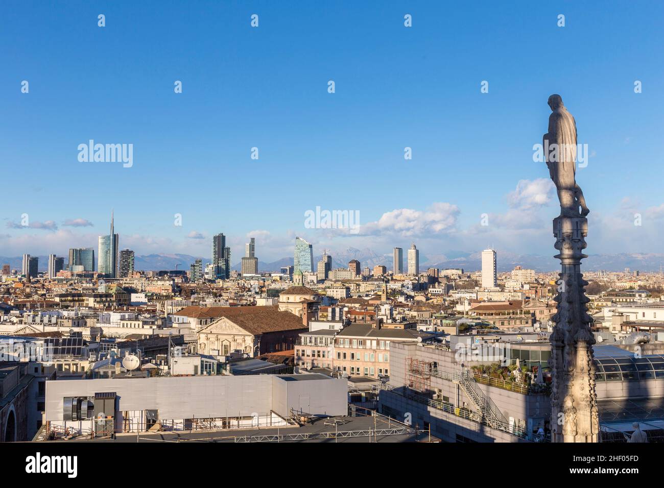 skyline of milan from famous Milan Cathedral under blue sky Stock Photo ...