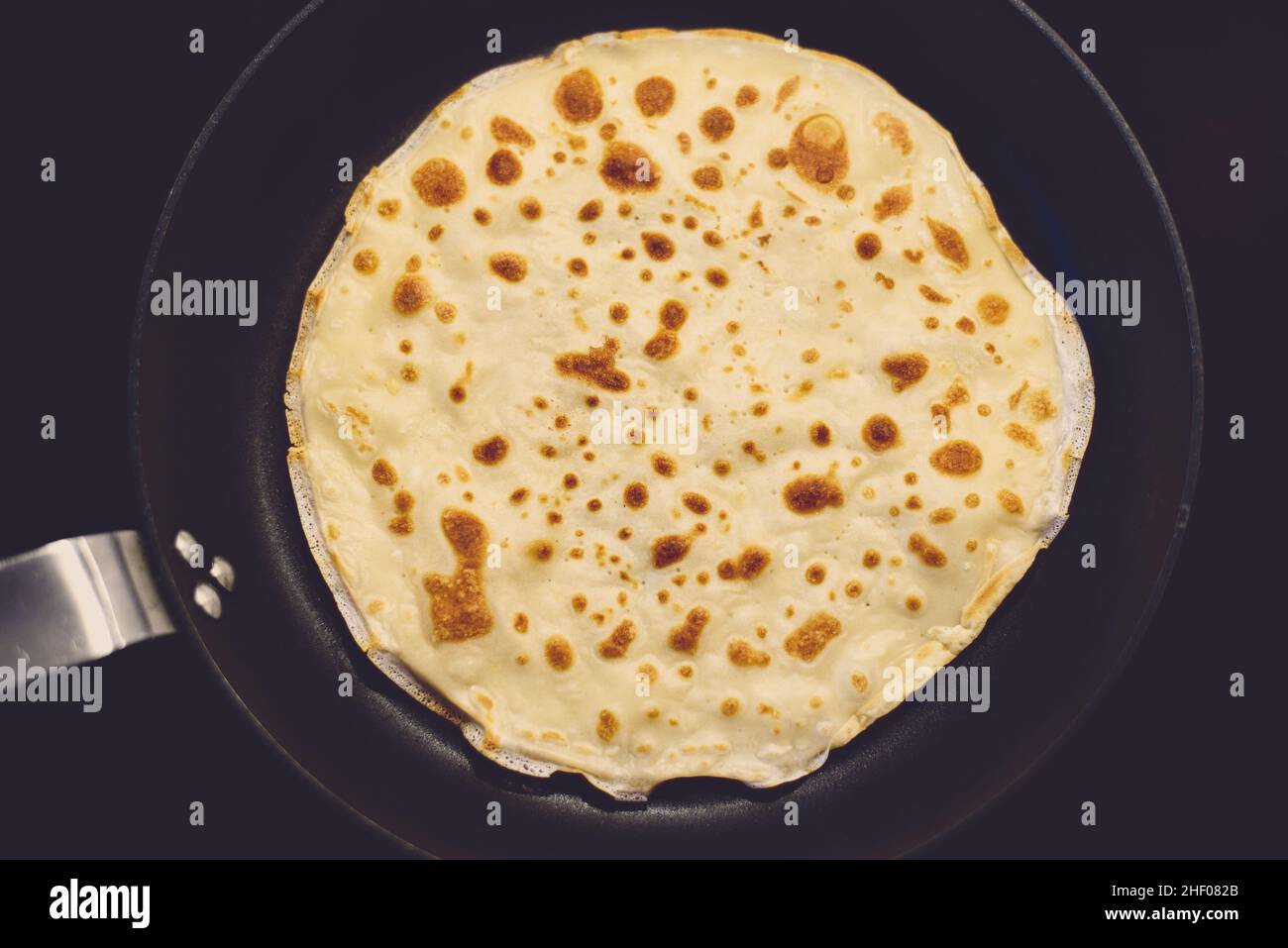 Cooking crepe in pan hi-res stock photography and images - Alamy