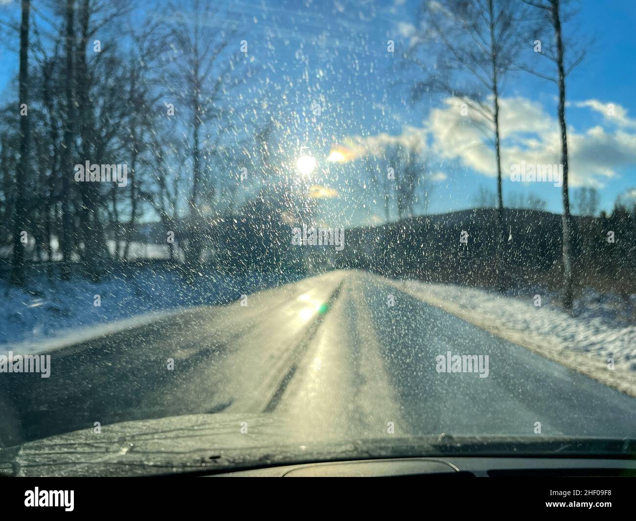driving through the snow sun blinds Stock Photo - Alamy