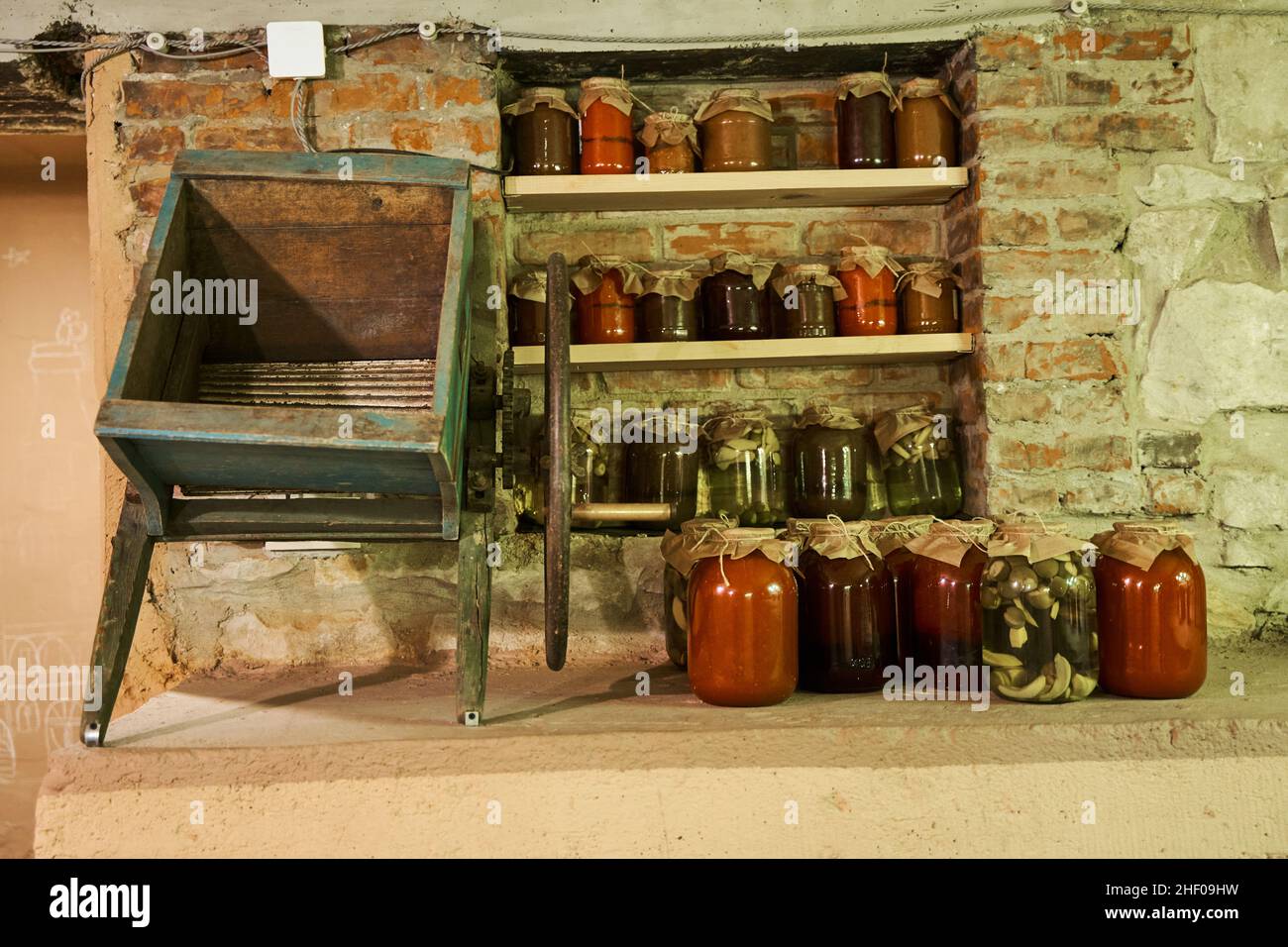 Preserved jars in the cellar. Stocks for the winter Stock Photo - Alamy