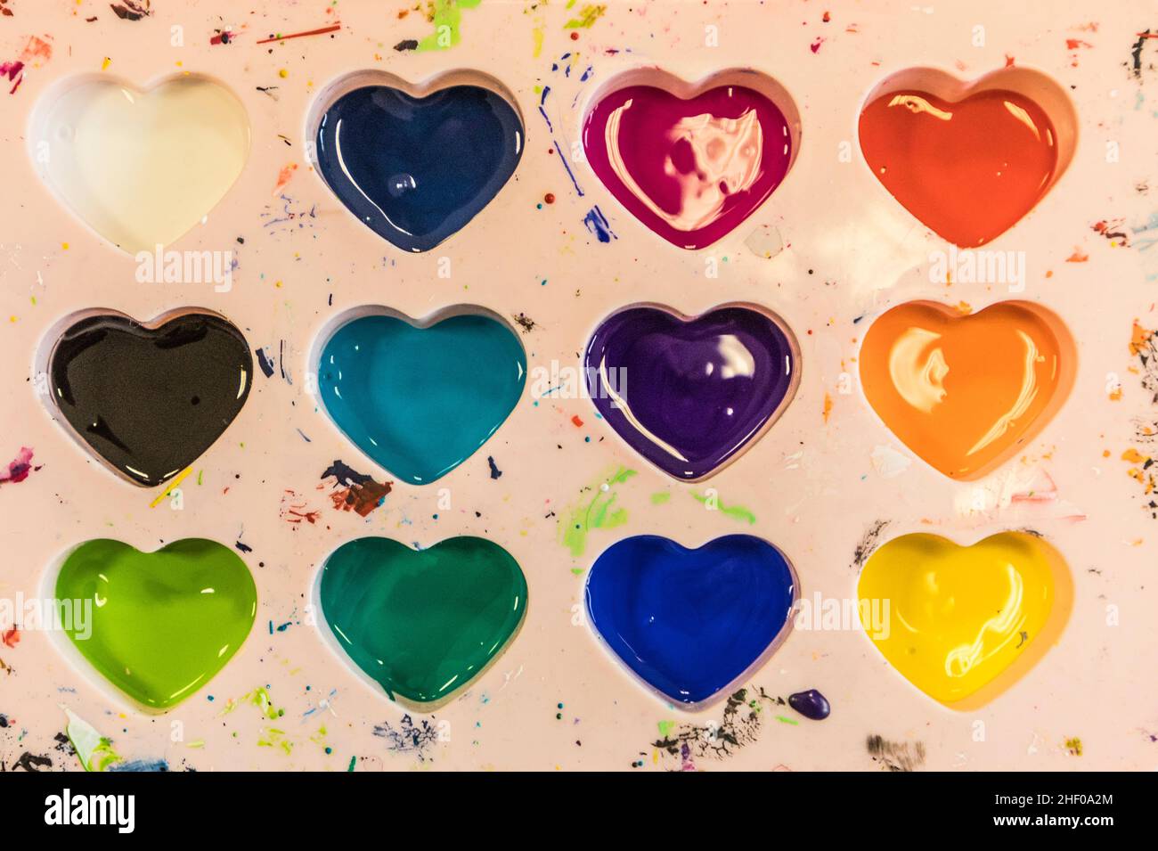 rainbow colors in heart shape at an artists palette Stock Photo - Alamy