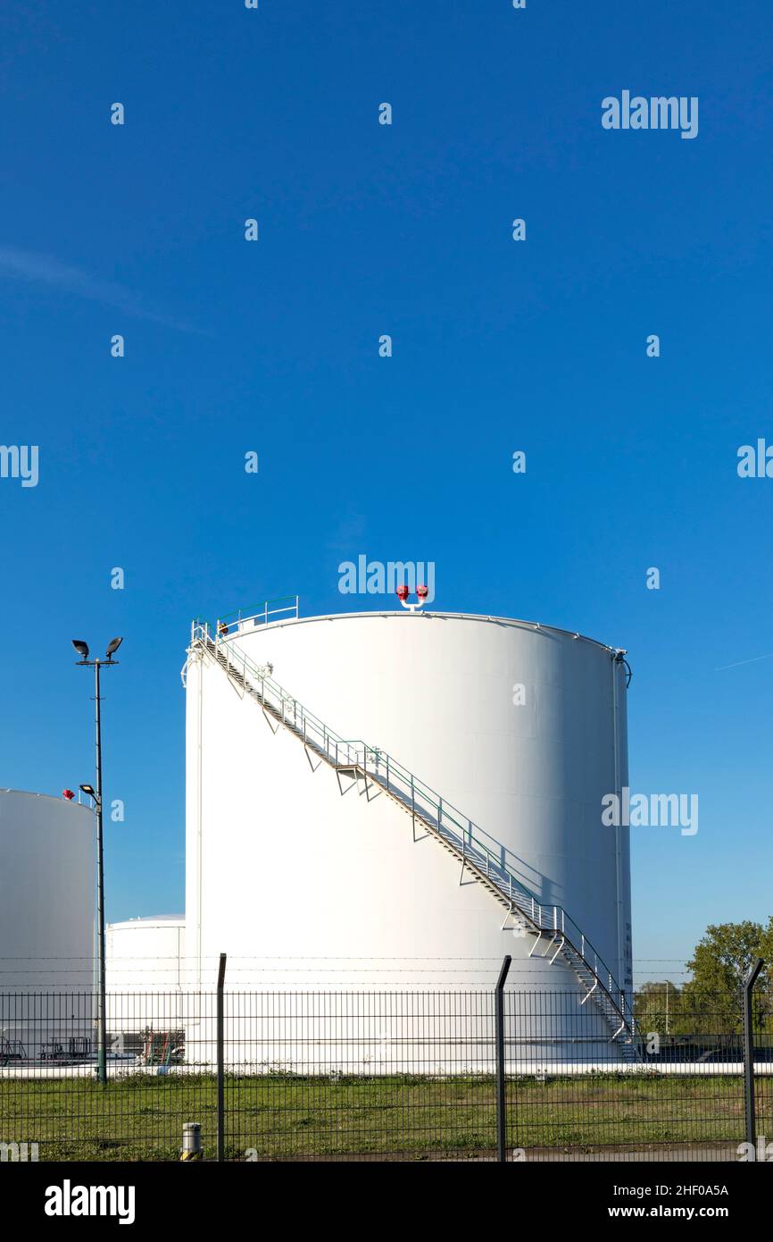 huge white silos in a silo farm with petrol Stock Photo - Alamy