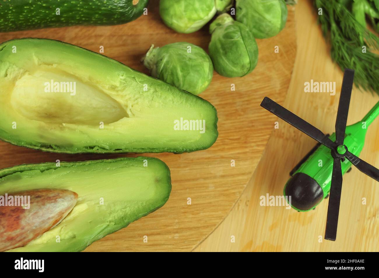 Green helicopter and vegetables import export of healthy food concept ...