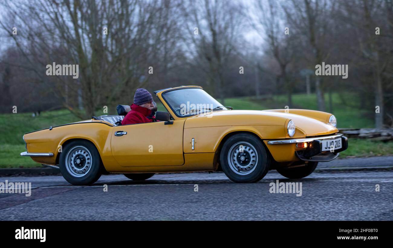 1978 yellow Triumph Spitfire classic sports car Stock Photo - Alamy