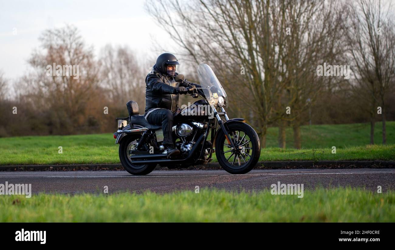 Man riding a harley Davidson motorcycle Stock Photo - Alamy