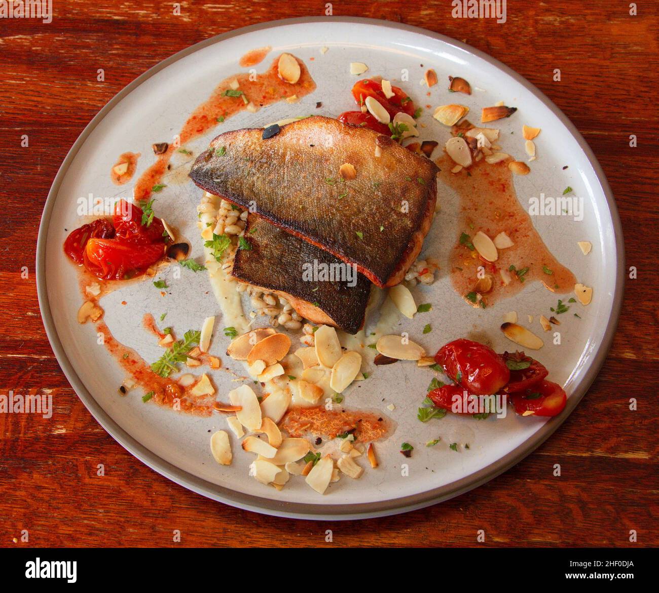 Butter fried arctic charr in a restaurant in Iceland,Europe Stock Photo ...