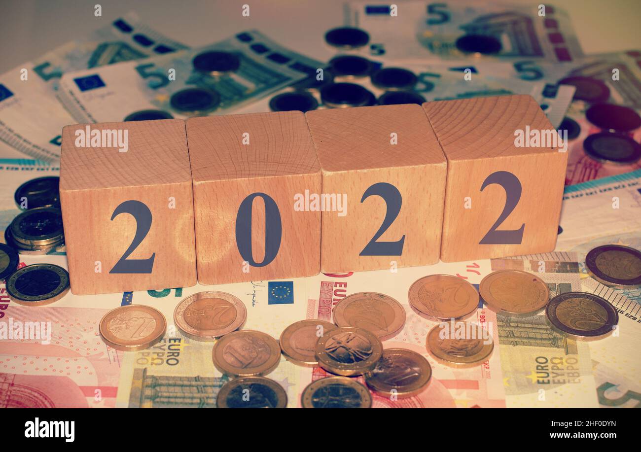 2022 New year saving money and financial planning concept. Stack of ...