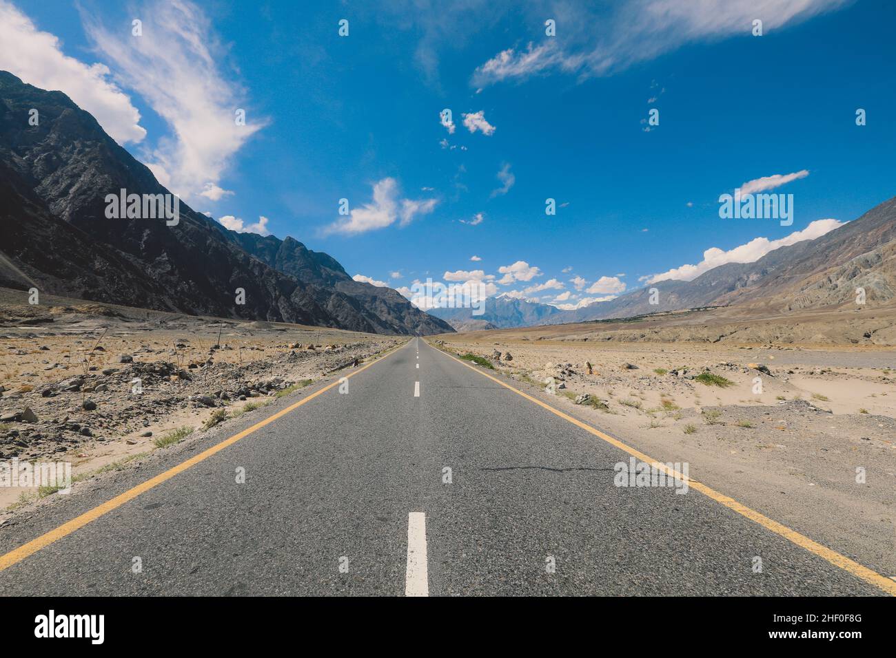 Asphalt Road in the High Gilgit Baltistan Mountains under the Blue ...