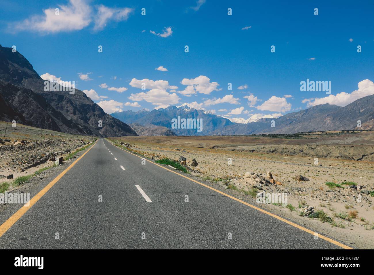 Asphalt Road in the High Gilgit Baltistan Mountains under the Blue ...