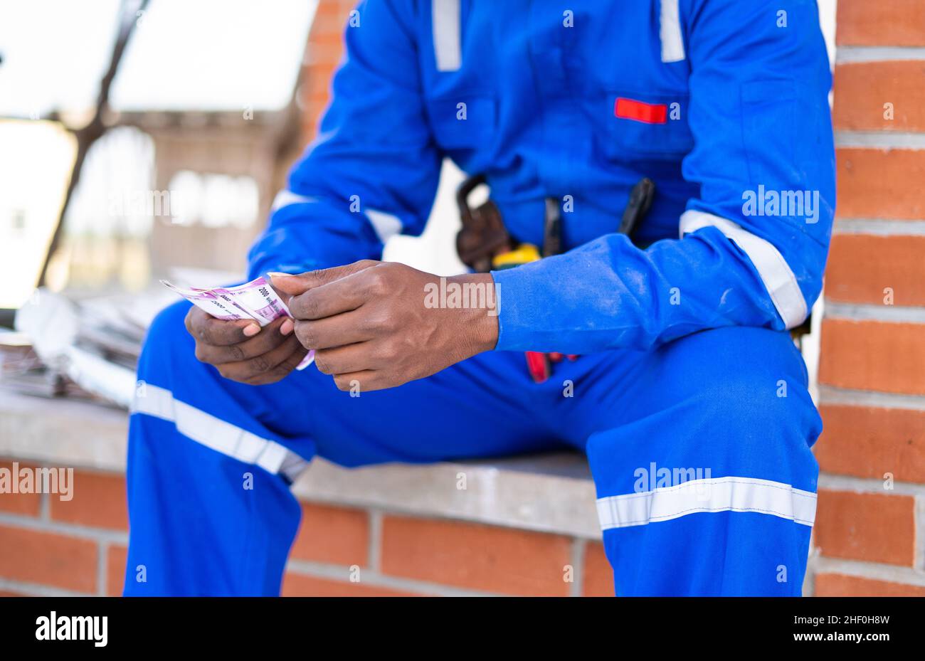 Close up shot of unrecognizable labour counting Money - concept of ...