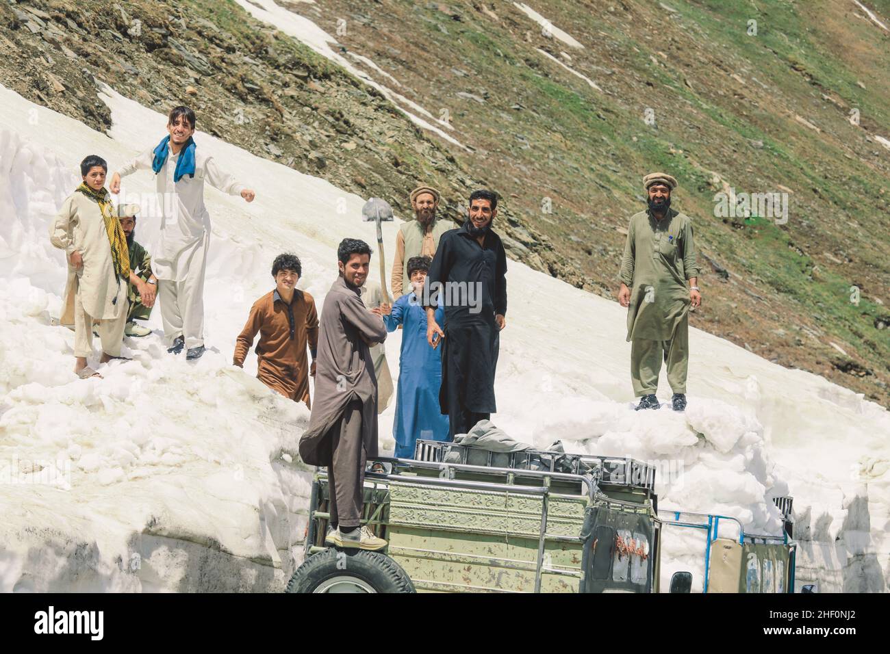 Gilgit, Pakistan - June 08, 2018: Pakistani People Collect Snow and ...