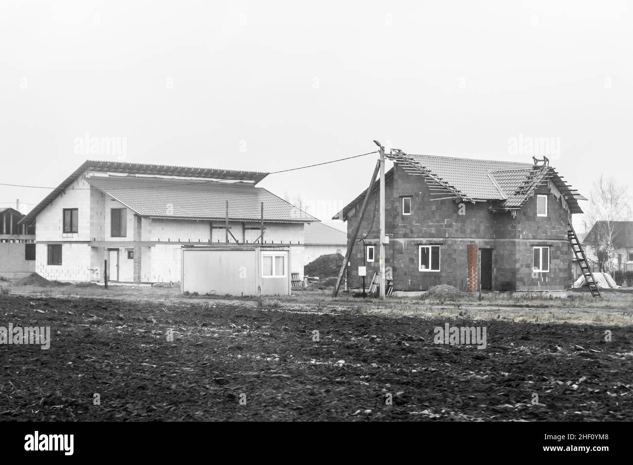 Unfinished construction in rural area. Unfinished building outdoor ...