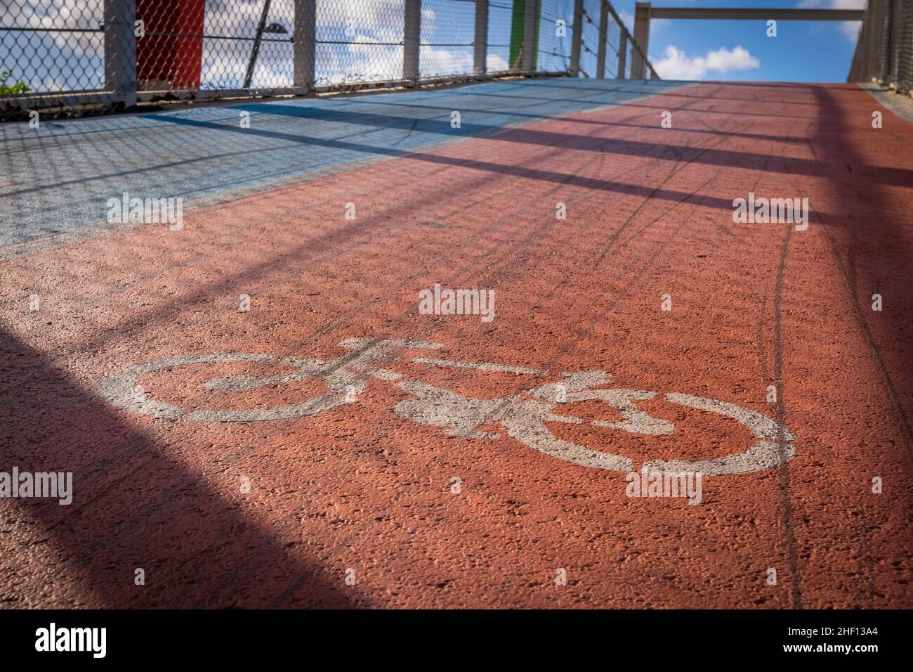 Bicycle logo on the red track ground up the hill in bicycle academy in ...