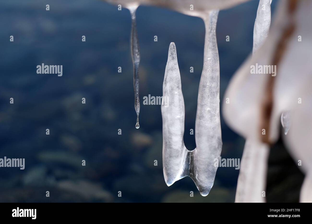 Reverse gravity. Icicles melting down, another icicle melting up Stock ...