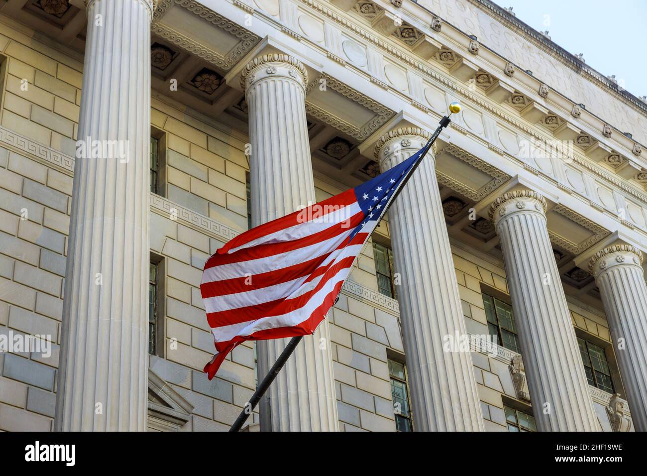 Washington DC building detail with waving American flag Stock Photo - Alamy