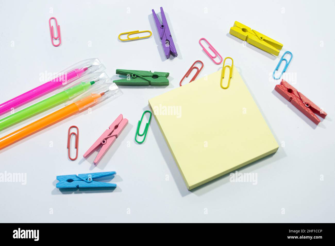Set of colorful paper clips with white copy space background. Business ...