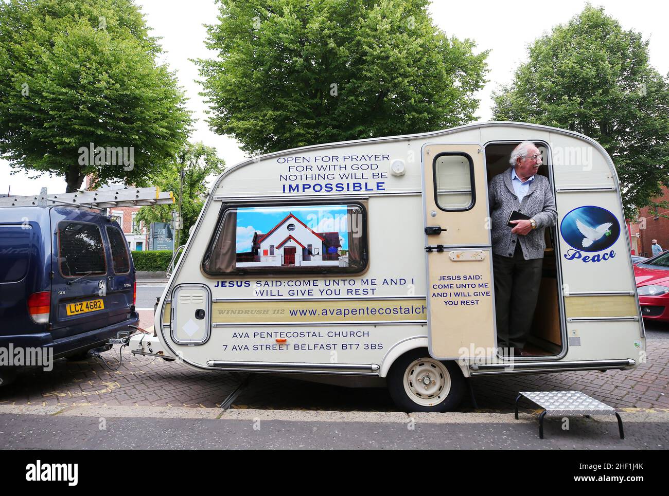 A religious Christian pastor pictured conducting his street evangelism ...