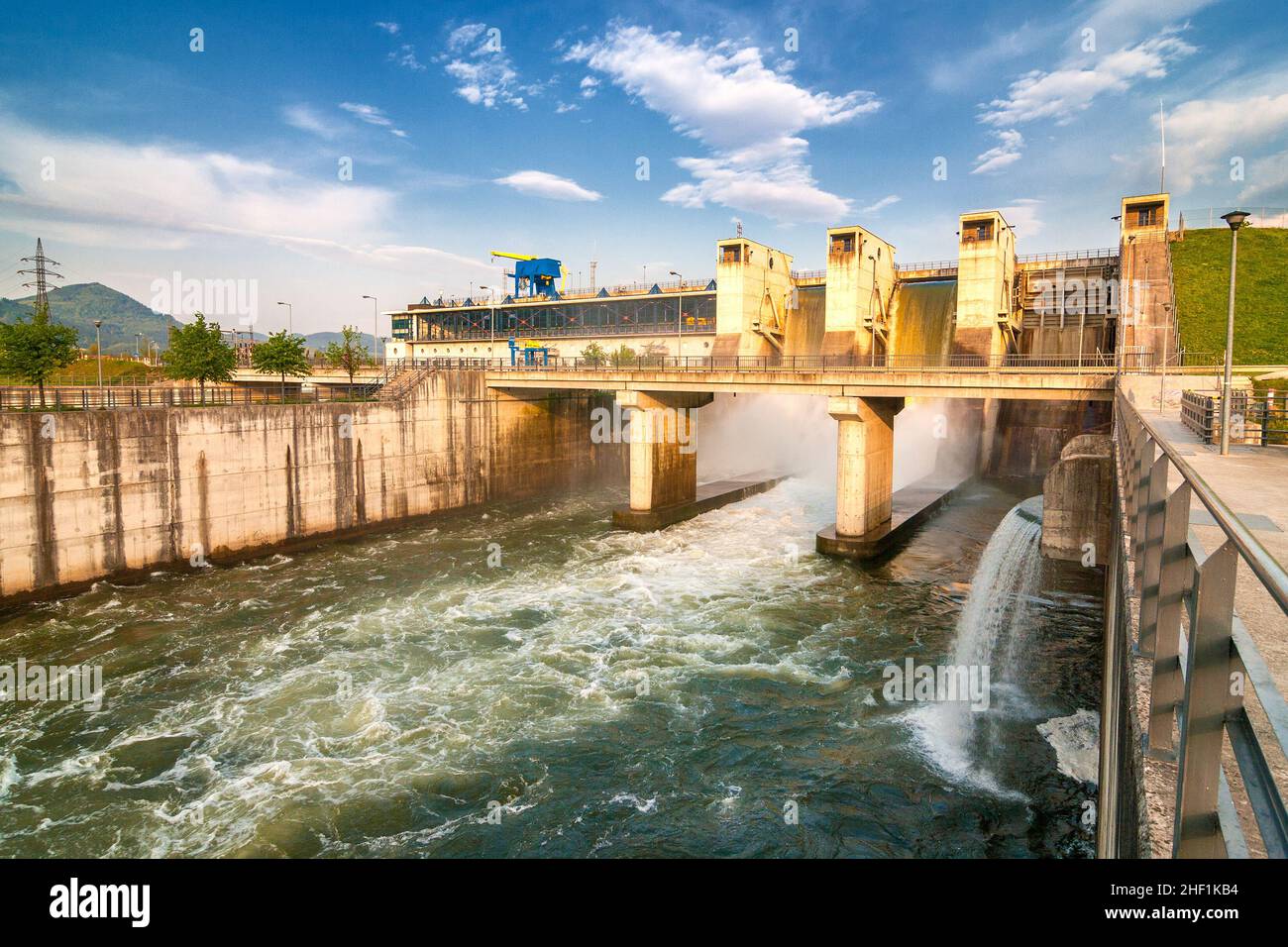 Draining water from the hydroelectric dam Stock Photo - Alamy